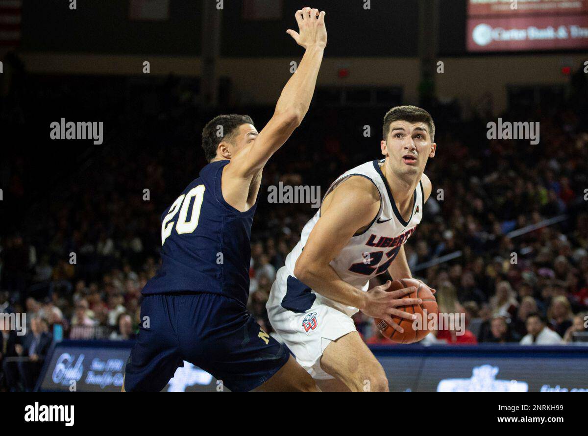 Liberty forward Kyle Rhodes eyes the basket before going for the shot ...