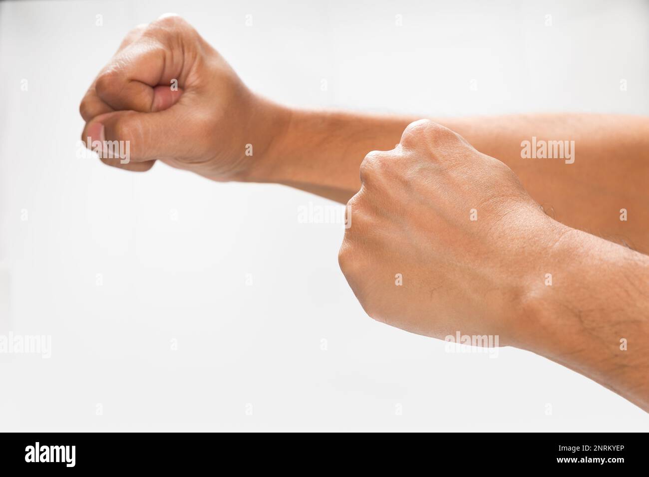 A man angry and aggressive man threatening with fist Stock Photo - Alamy