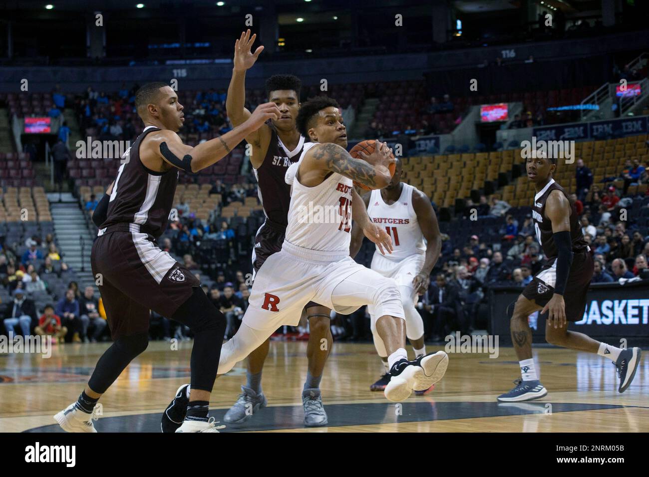 Rutgers' Jacob Young drives through the St. Bonaventure defense during ...