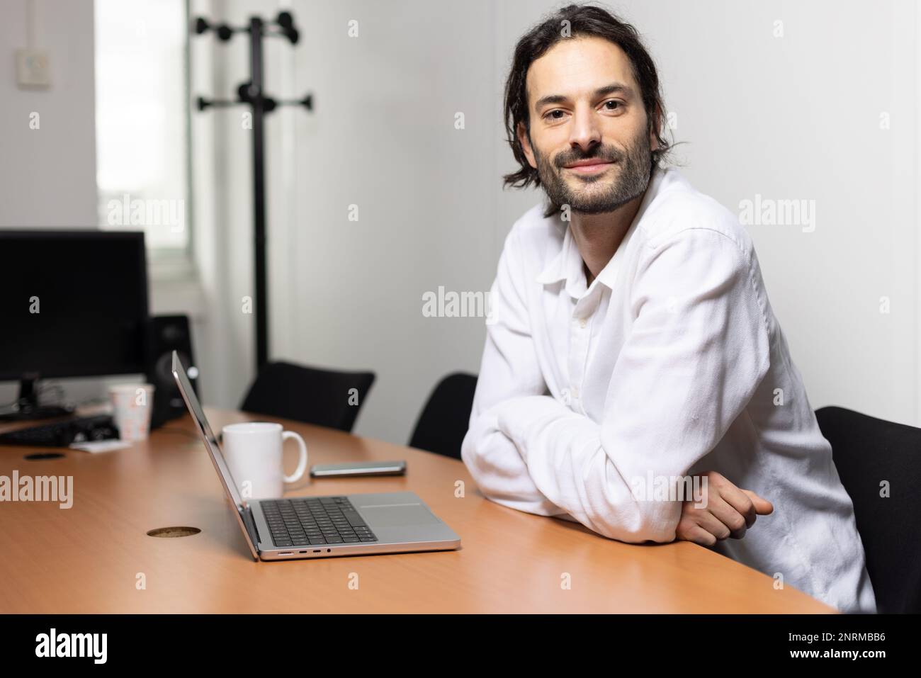 Smiling male office worker hi-res stock photography and images - Alamy