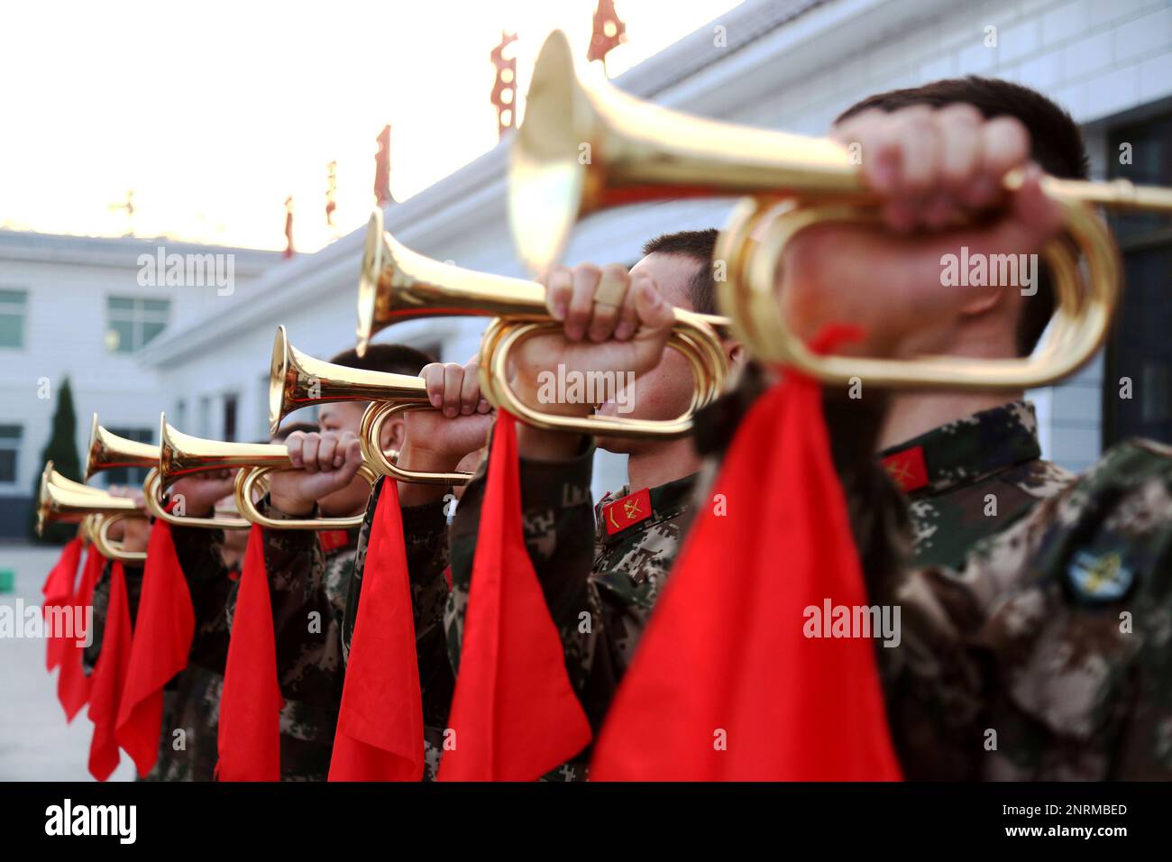 Buglers practice with the bugles at the paramilitary training compound ...