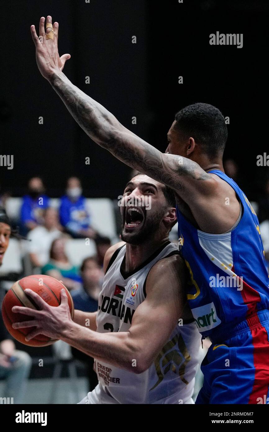 Jordan's Hashem Abbaas, left, and Philippines' Jamie Malonzo during ...