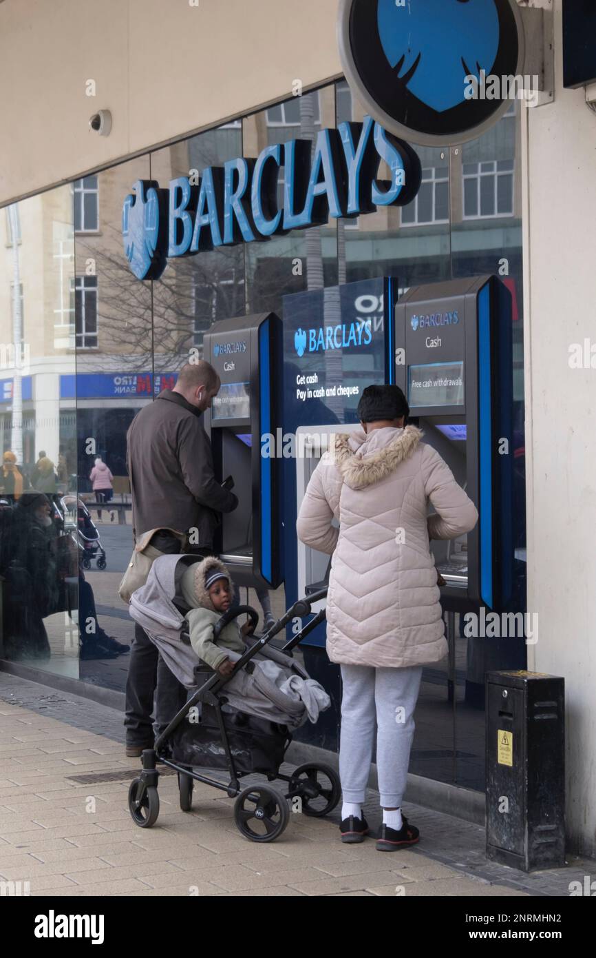 Using the cash machine hi-res stock photography and images - Alamy