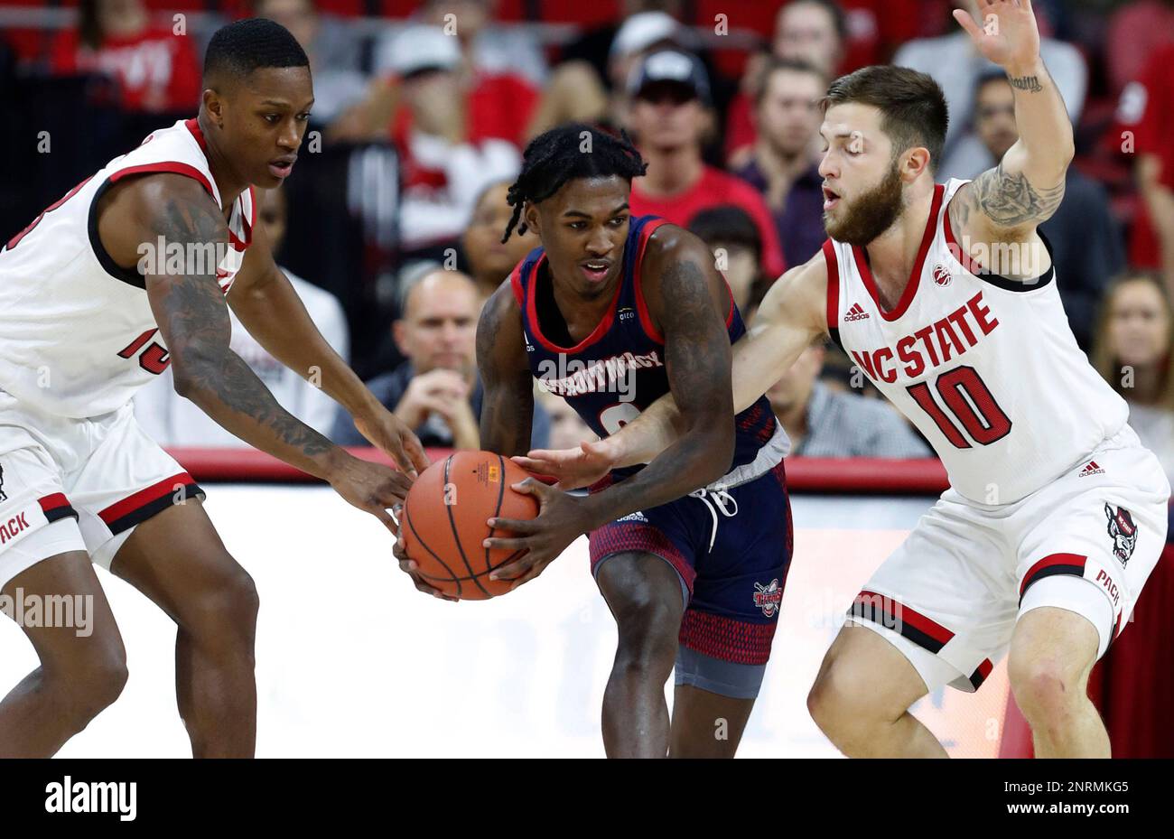 North Carolina State's Braxton Beverly, right, and C.J. Bryce pressure ...