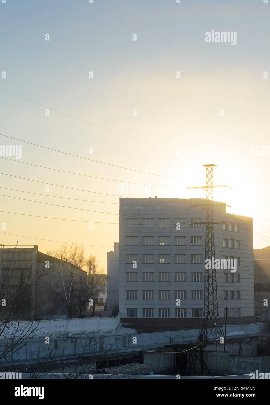 Factory buildings and a coal-fired thermal power plant on the outskirts ...