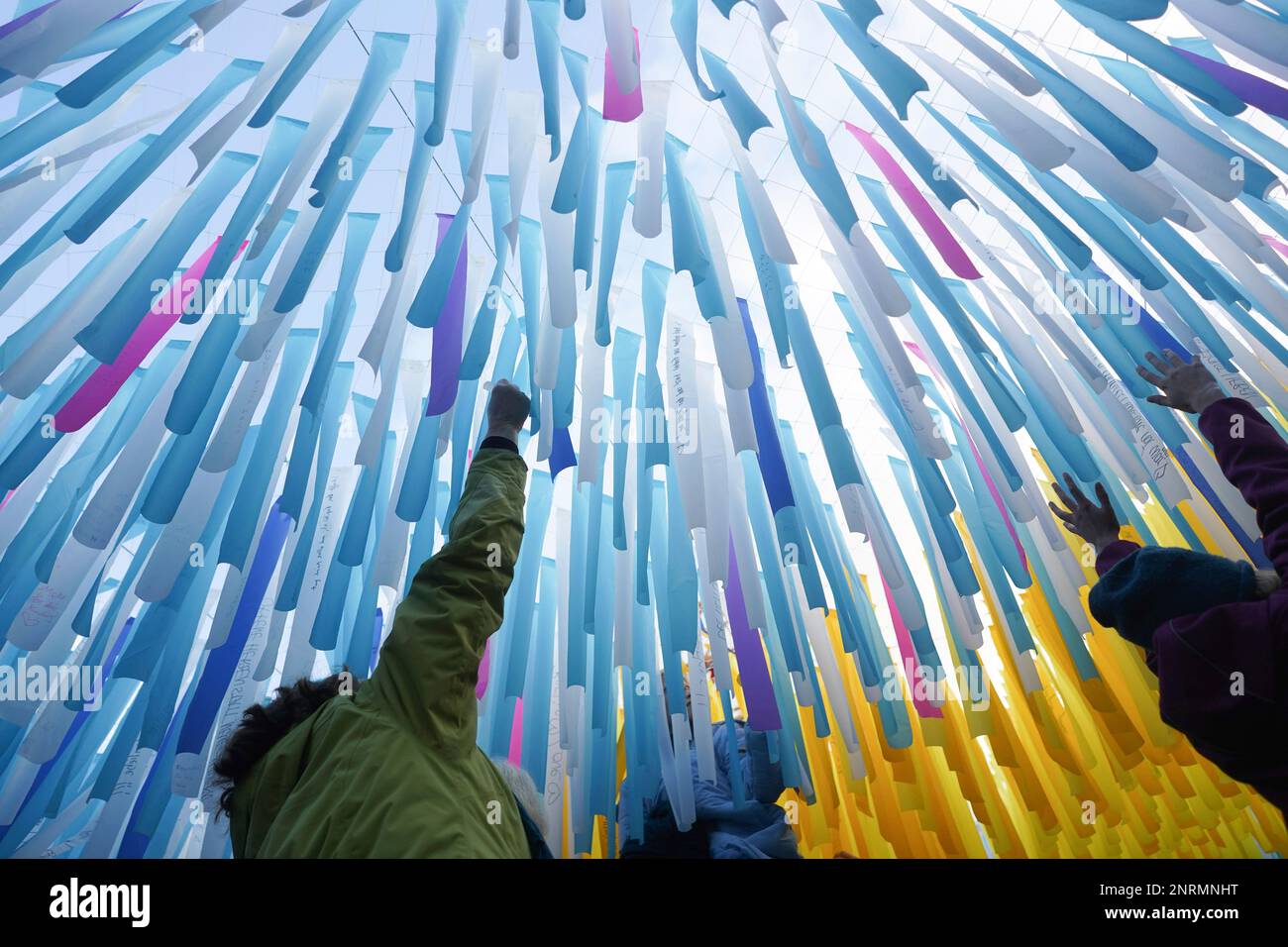 People touching the art installation 'Visions in Motion' by US artist ...