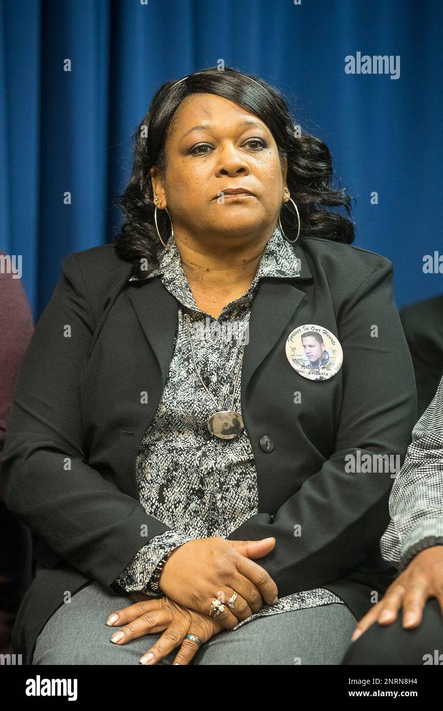 Carolyn Baylor Giummo, mother of Air Force Veteran Anthony Hill, wears ...