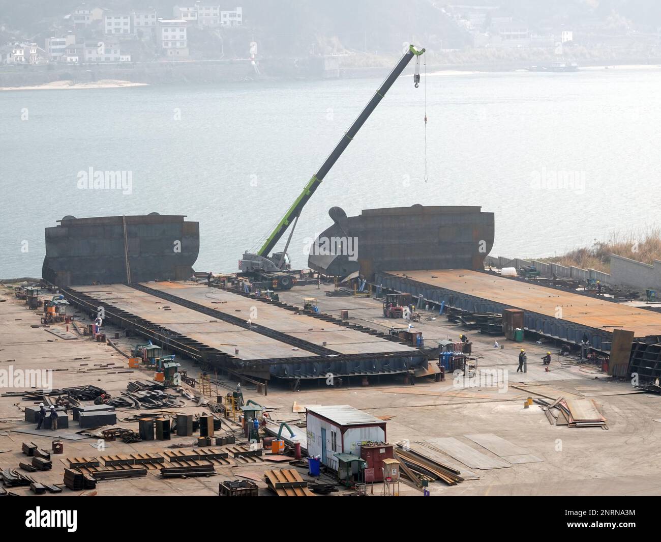 YICHANG, CHINA - FEBRUARY 27, 2023 - Shipyard workers build ships in ...