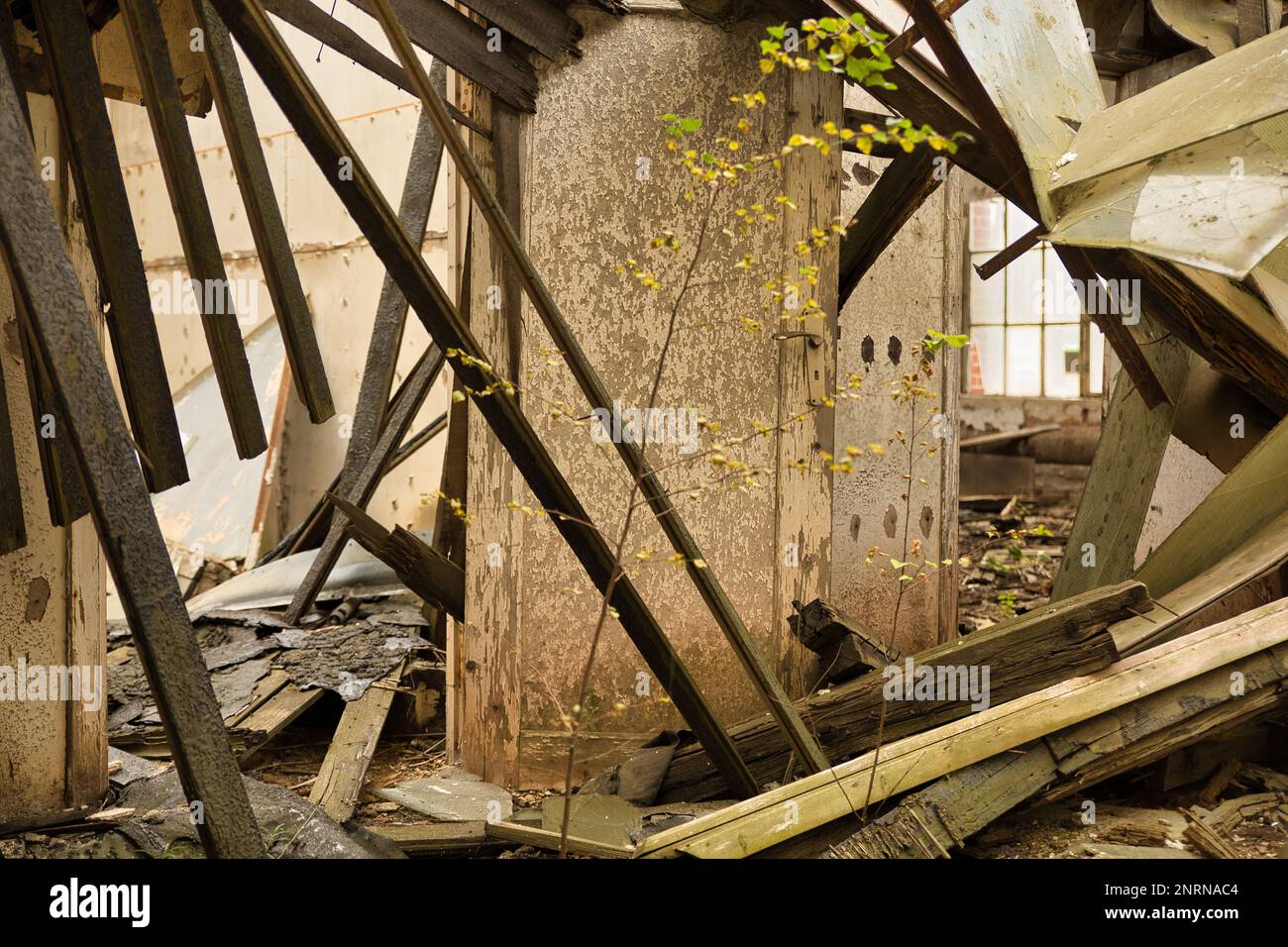 Abandoned place Industrial building: Sephia-coloured room with fallen ...