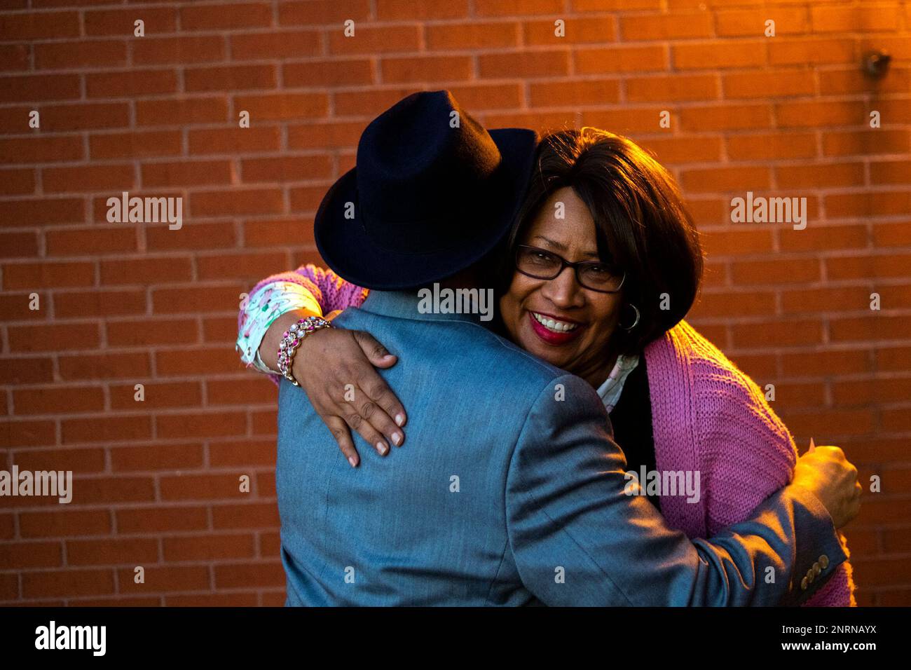 Flint resident Wyvette VanDerson hugs Flint mayoral candidate Sheldon ...