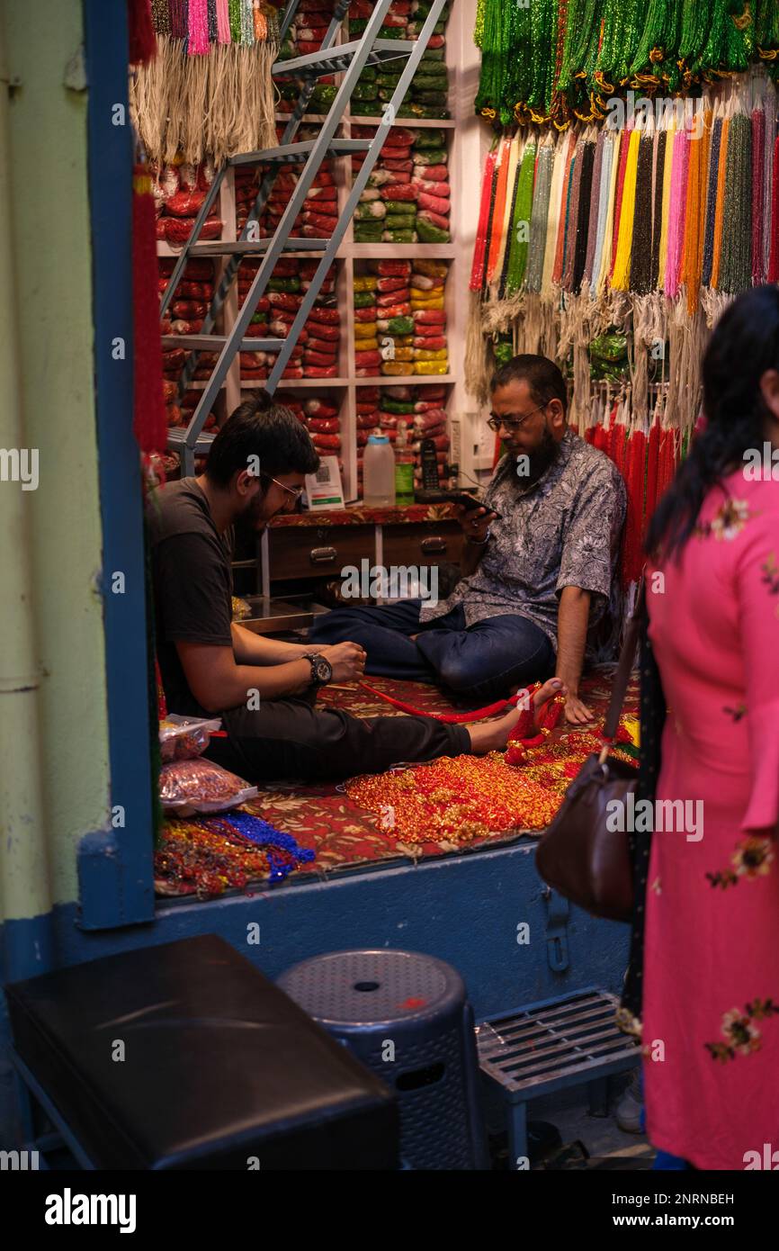 Kathmandu, Nepal, 04 23 2022: A man sitting in his booth on Kathmandu ...