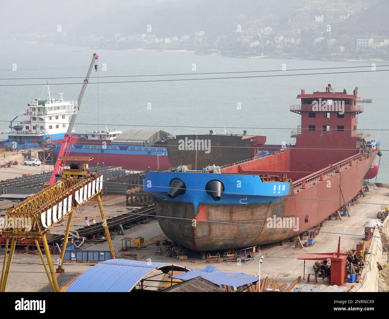 YICHANG, CHINA - FEBRUARY 27, 2023 - Shipyard workers build ships in ...