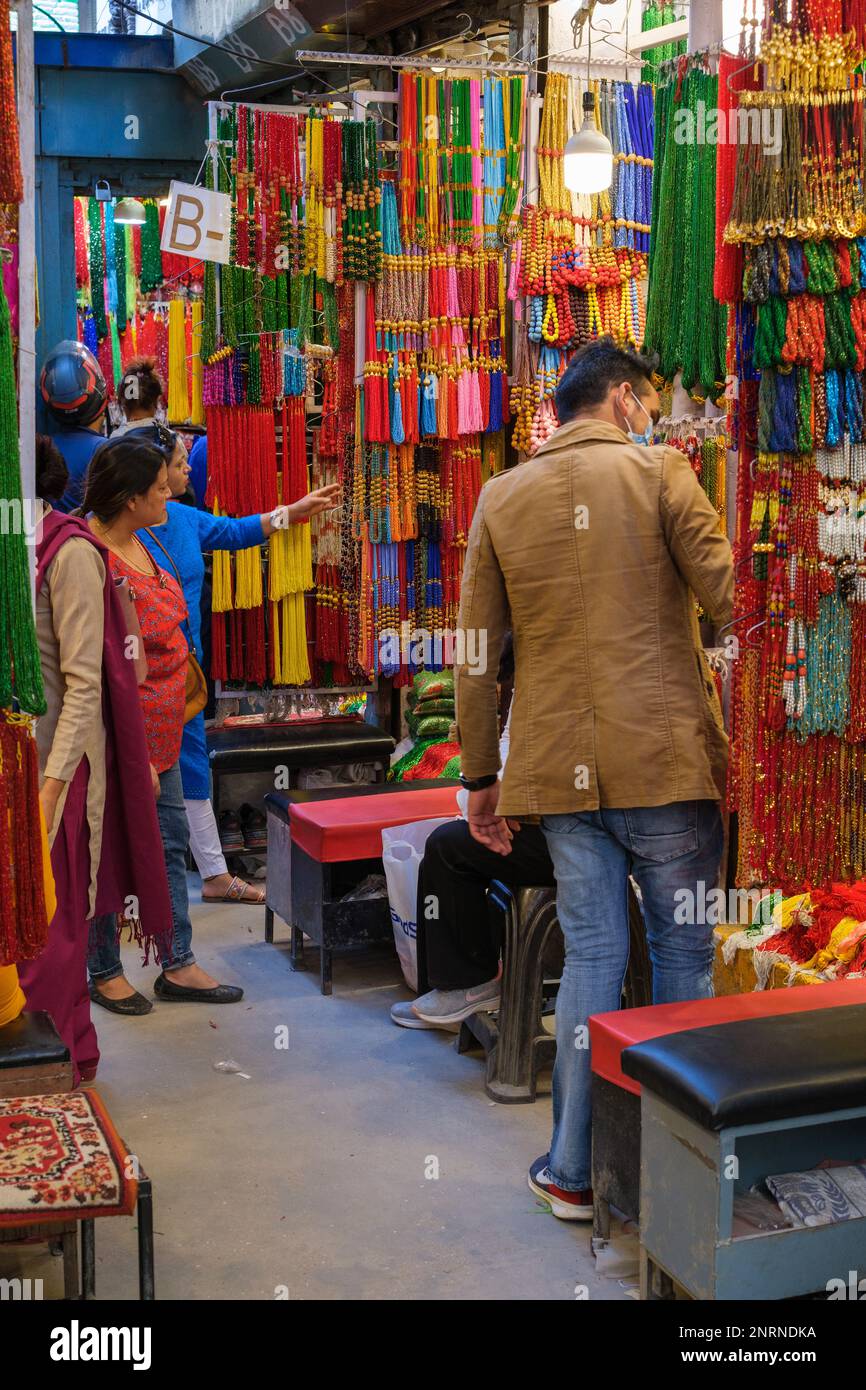 Kathmandu, Nepal, 04 23 2022: Booths of cloth in Kathmandu bazaar Stock ...