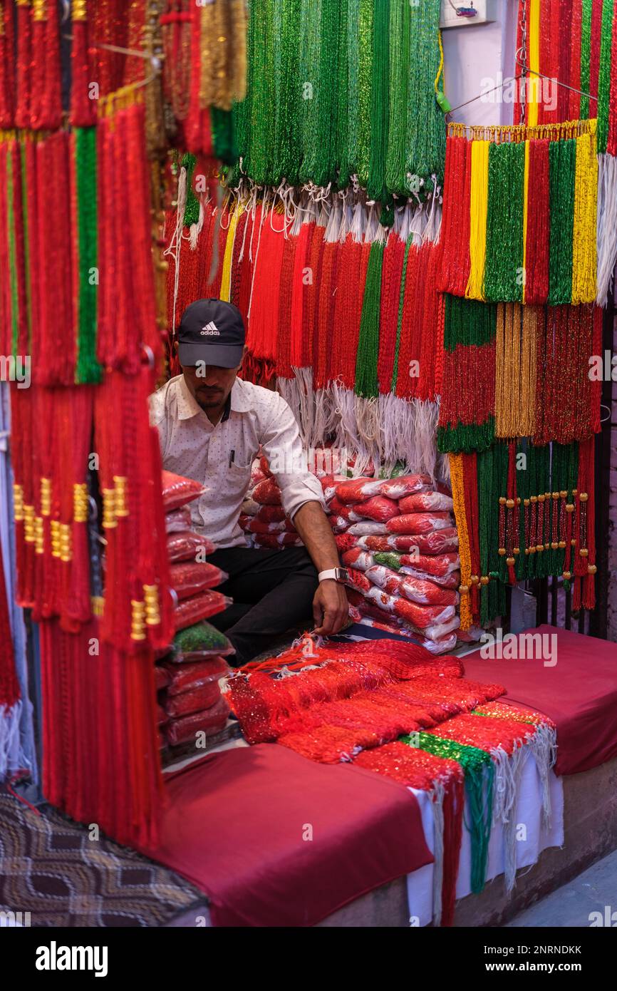 Kathmandu, Nepal, 04 23 2022: A man sitting in his webbing booth in ...