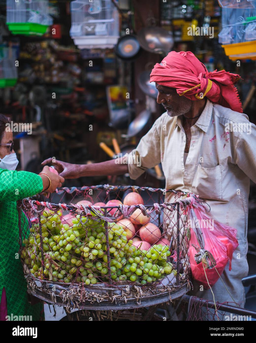 Kathmandu, Nepal, 04 23 2022: a man selling fruit in Kathmandu market ...