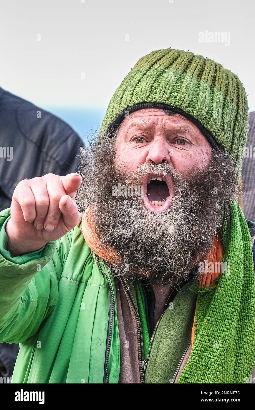 An angry man shouting and yelling during a demonstration organised by ...