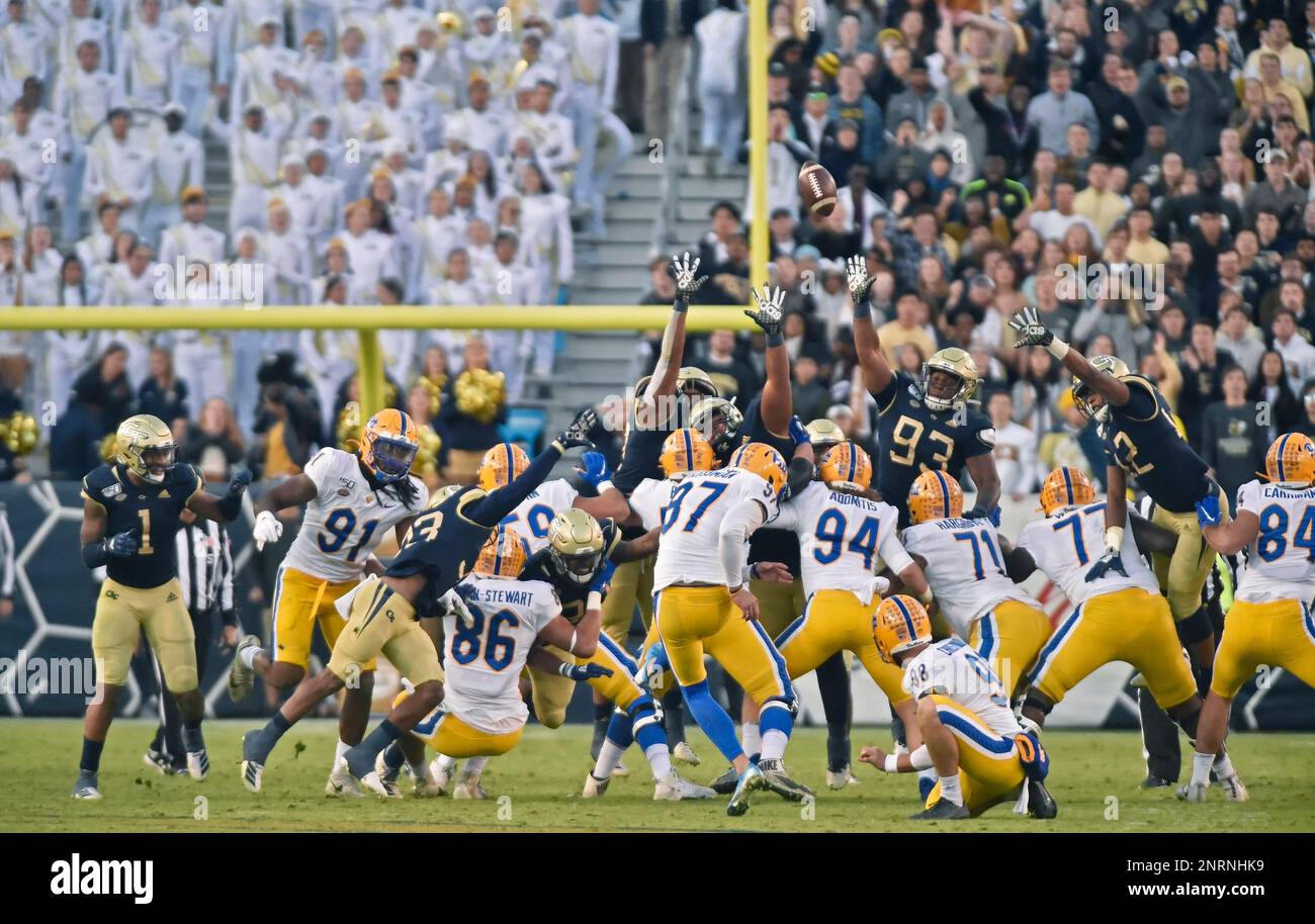 ATLANTA, GA - NOVEMBER 2: Georgia Tech players try to block a Pitt ...