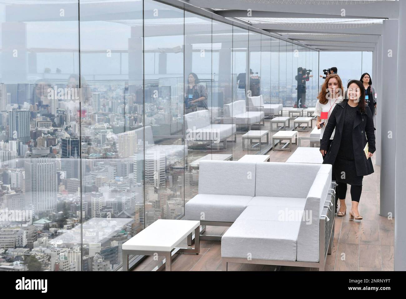 Visitors climb up " Shibuya Sky" on the rooftop of Shibuya Scramble ...