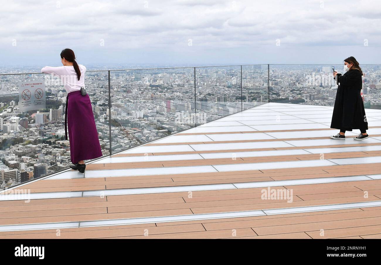Visitors climb up " Shibuya Sky" on the rooftop of Shibuya Scramble ...