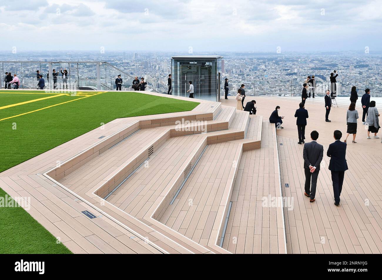 Visitors climb up " Shibuya Sky" on the rooftop of Shibuya Scramble ...