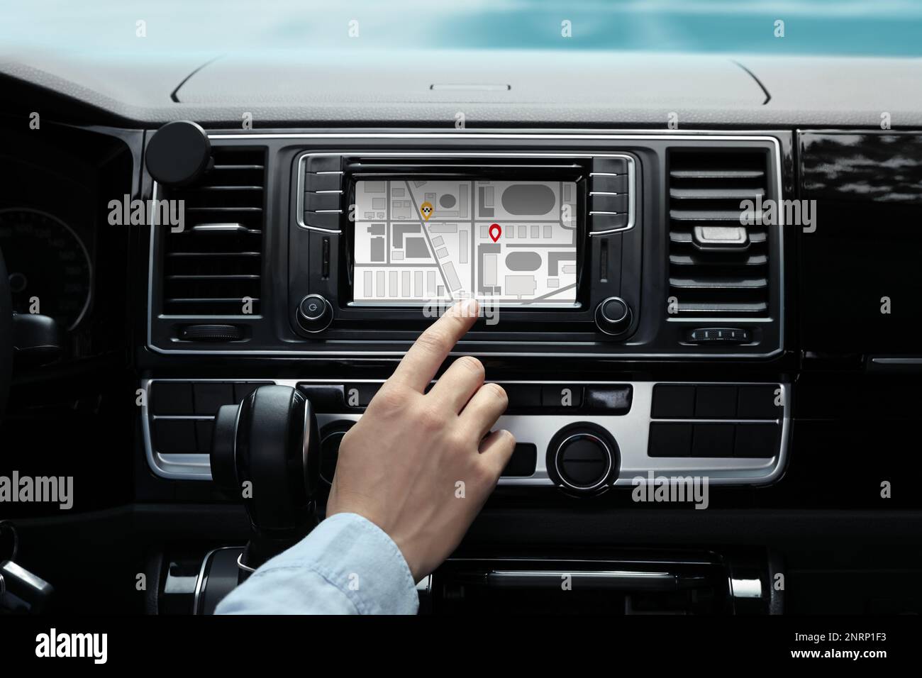 Man using navigation system while driving car, closeup Stock Photo - Alamy