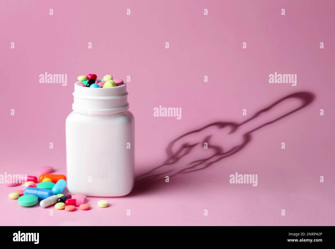 Doping concept. Plastic bottles with pills and silhouette of sportsman ...