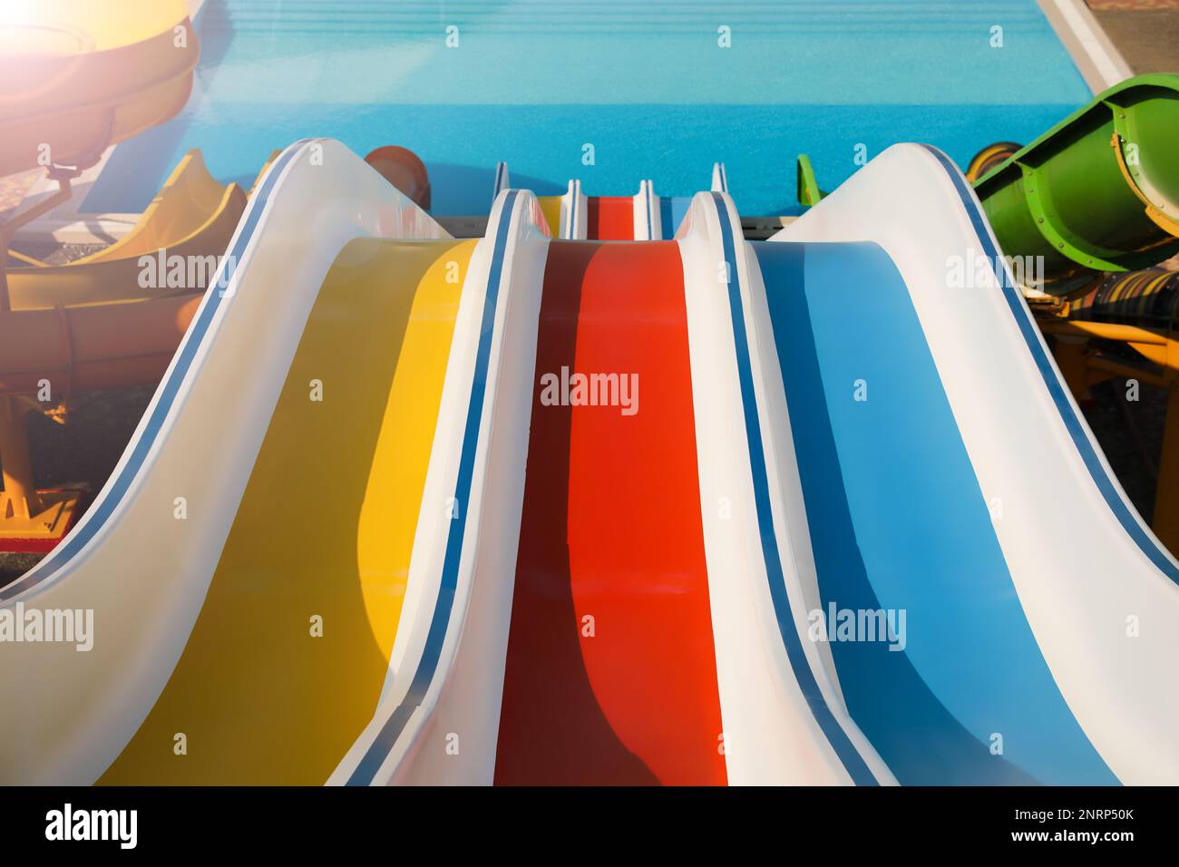 Modern water park yellow blue slide slides hi-res stock photography and ...