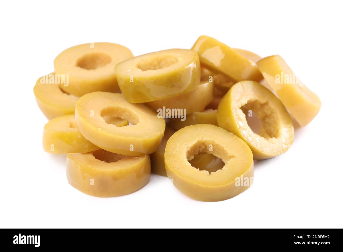 Cut fresh green olives on white background Stock Photo - Alamy