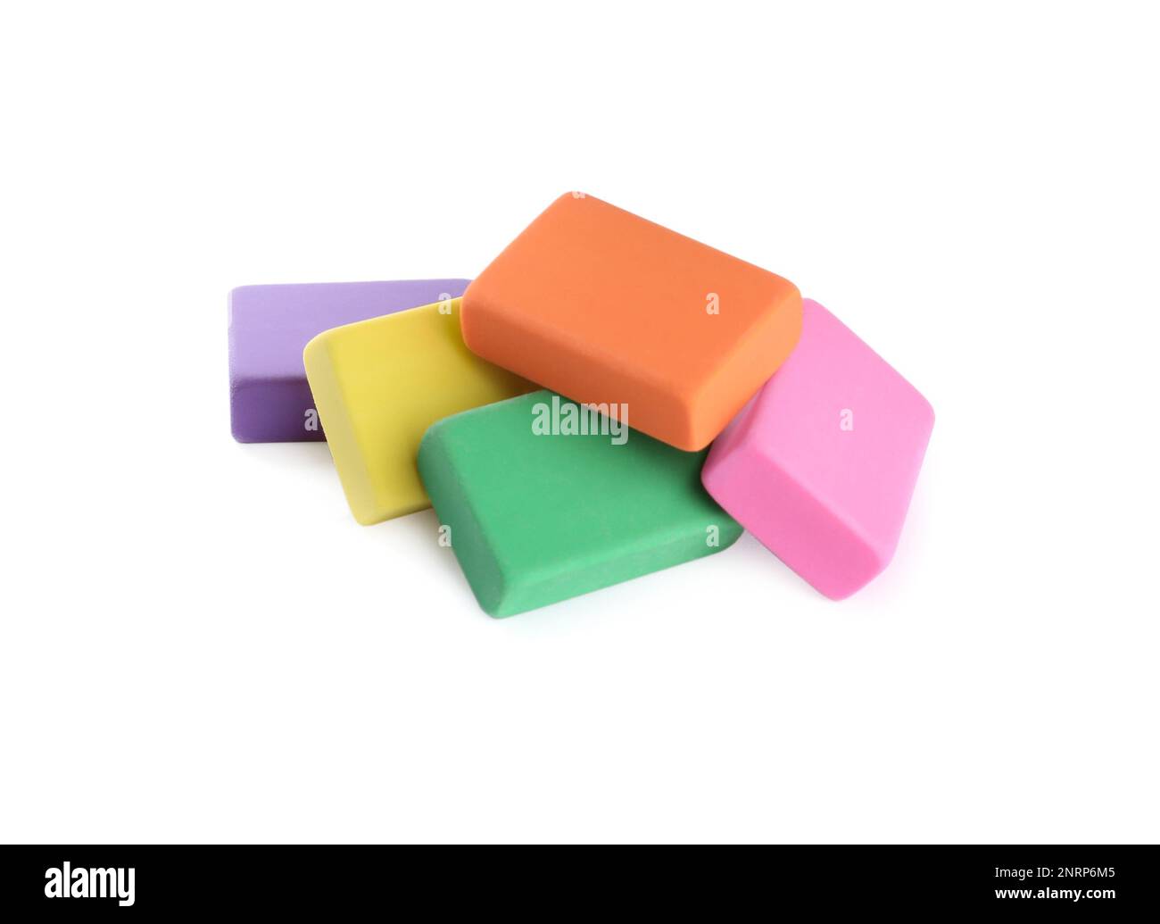 Pile of bright erasers on white background Stock Photo - Alamy