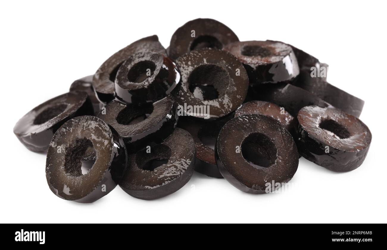 Cut fresh black olives on white background Stock Photo - Alamy