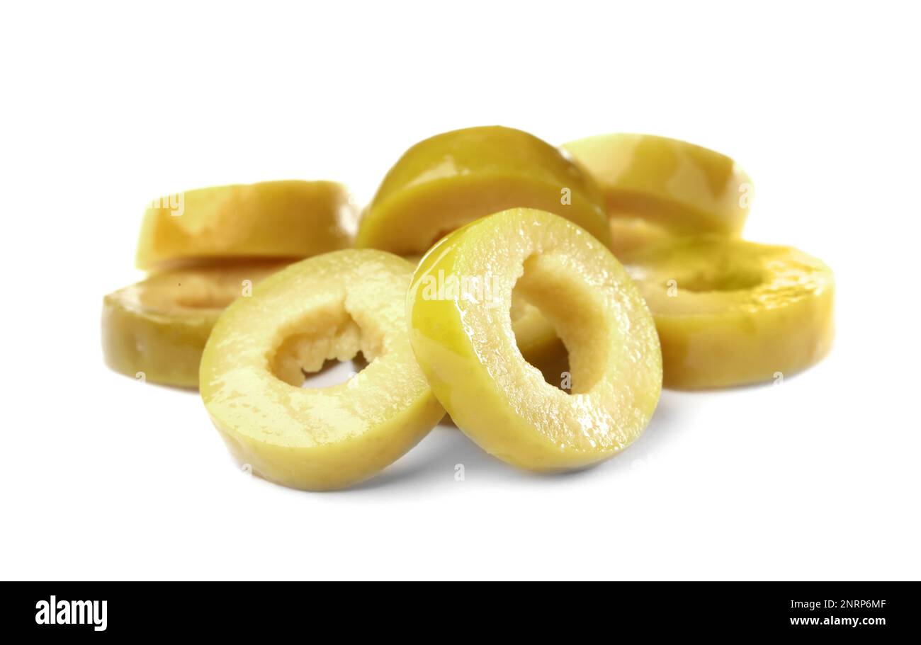 Cut fresh green olives on white background Stock Photo - Alamy