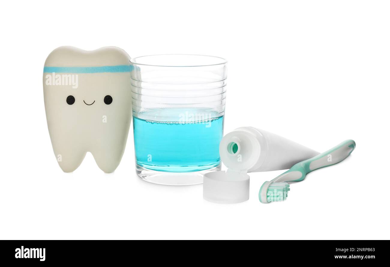 Mouthwash, toothbrush, paste and holder on white background Stock Photo ...