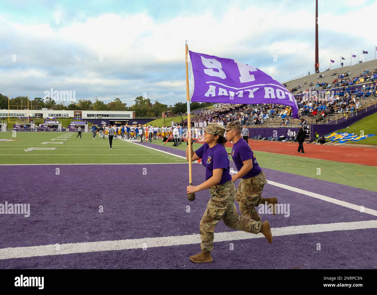 NACOGDOCHES, TX - OCTOBER 26: SFA ROTC Cannon Crew run across the end ...