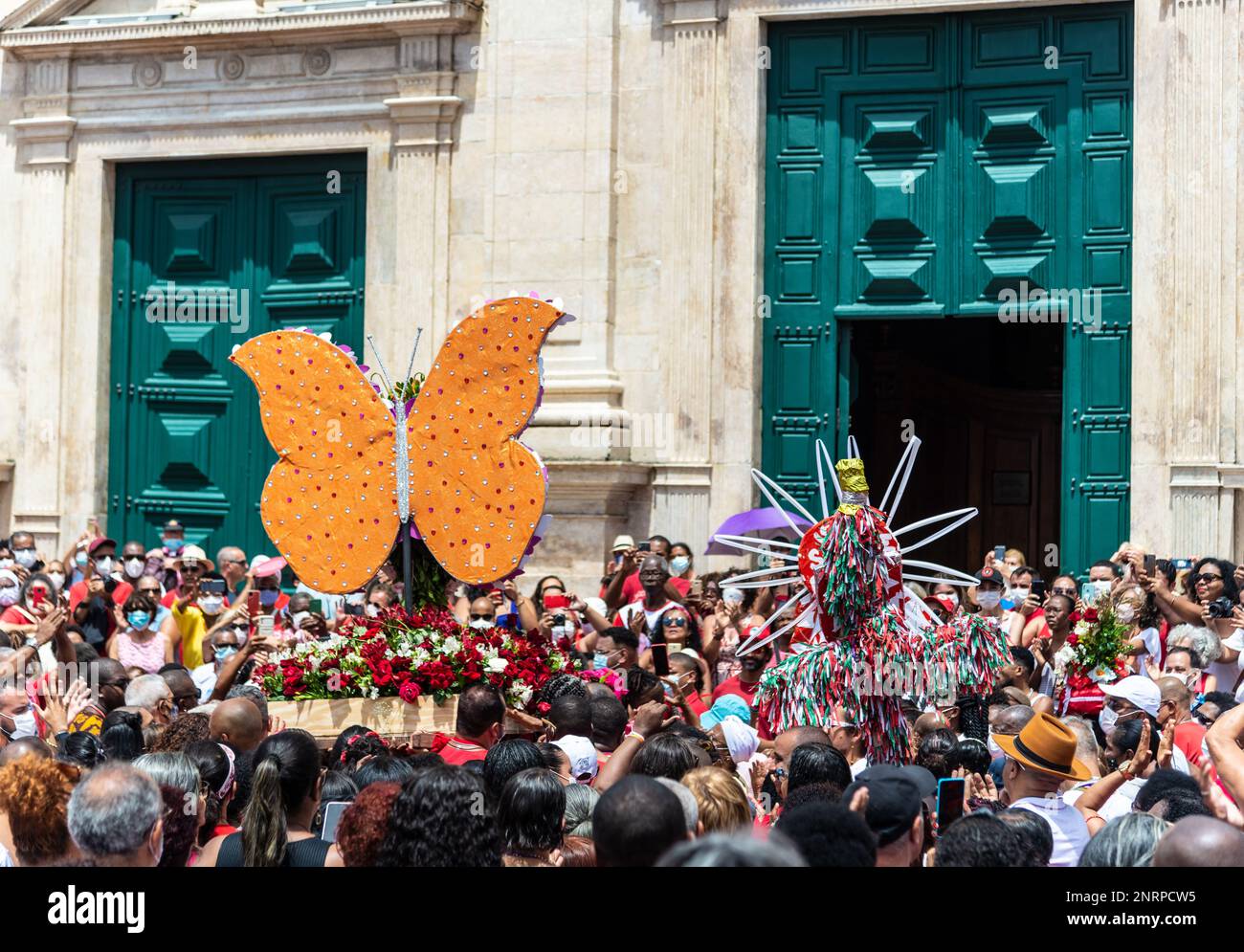 Faithful people in crowd are saluting Santa Barbara in Largo do ...