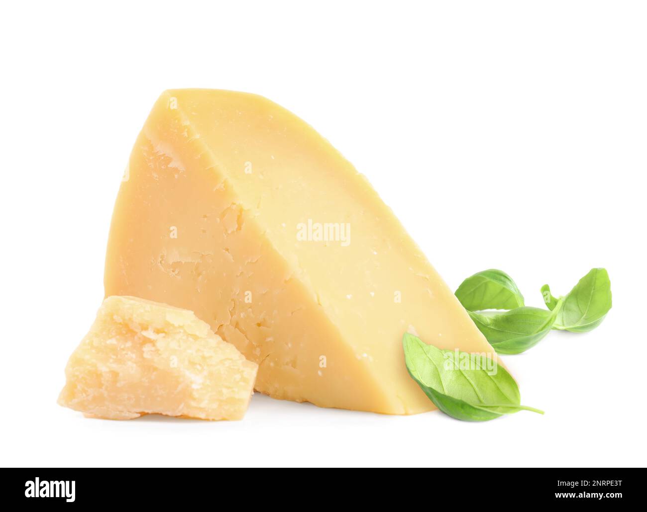 Delicious parmesan cheese and basil on white background Stock Photo - Alamy