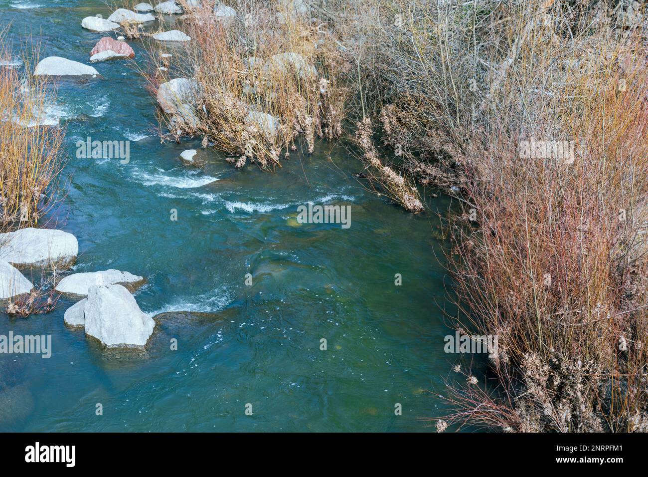 Water flowing through pebbles hi-res stock photography and images - Alamy