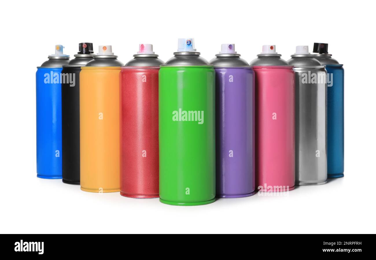 Cans of different spray paints on white background. Graffiti supplies ...