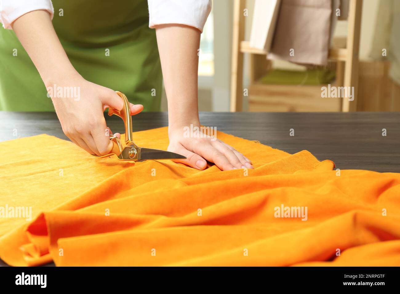 Cutting orange hi-res stock photography and images - Alamy