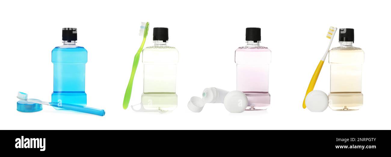 Set with bottles of mouthwash and other items for teeth care on white ...