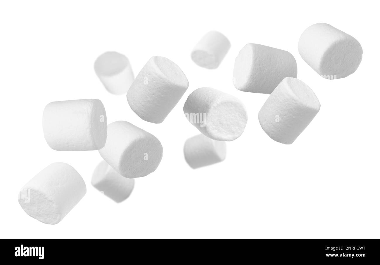 Delicious sweet puffy marshmallows flying on white background Stock ...
