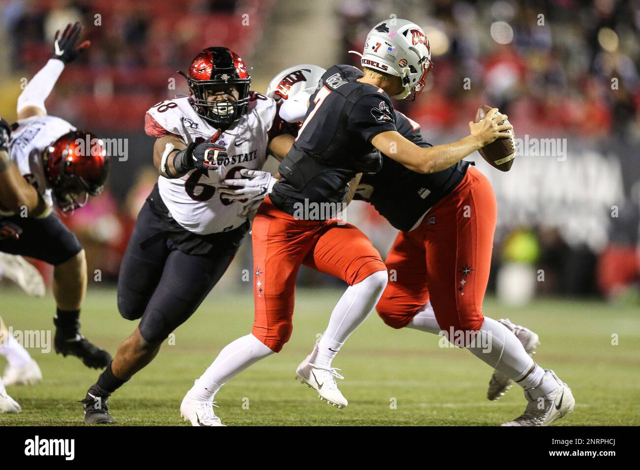 October 26, 2019: UNLV Rebels quarterback Kenyon Oblad (7) avoids San ...