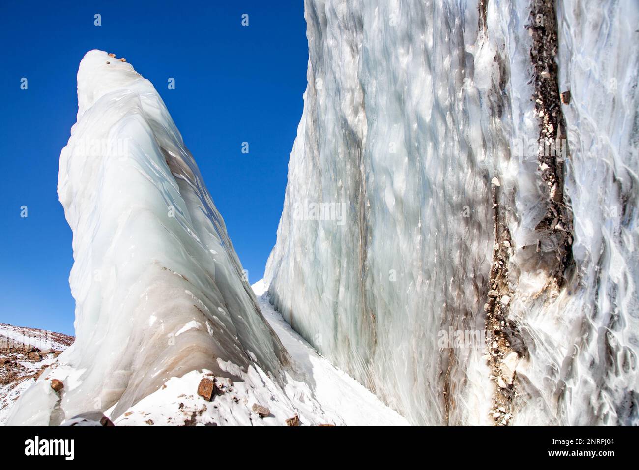 Beautiful ice cave in glacier. Winter mountain landscape Stock Photo ...