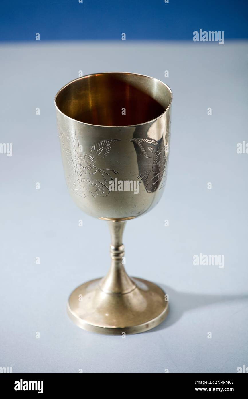 christian chalice on altar blue background blue background Stock Photo ...
