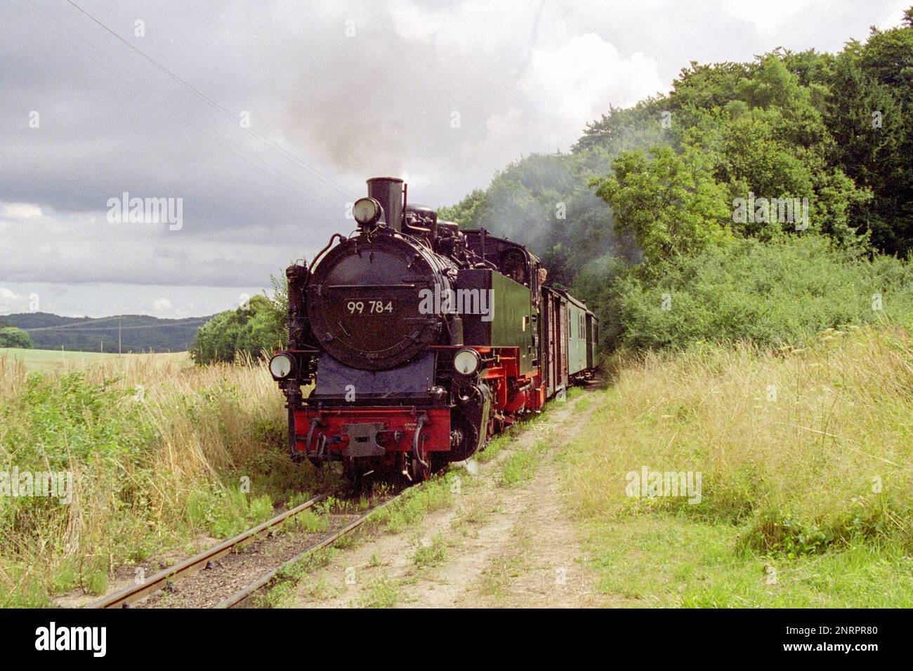 A steam train on the narrow gauge railway at Rugen in 1999 Stock Photo ...