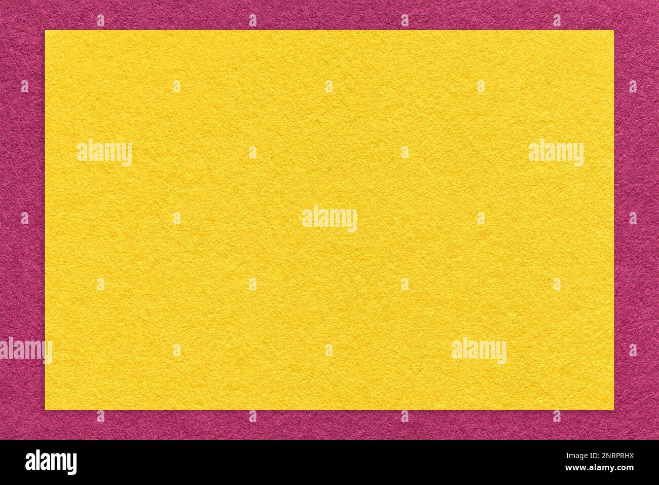 Texture of craft yellow color paper background with purple border ...