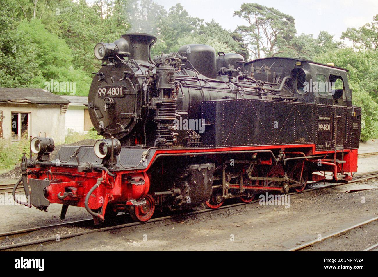 A steam train on the narrow gauge railway at Rugen in 1999 Stock Photo ...