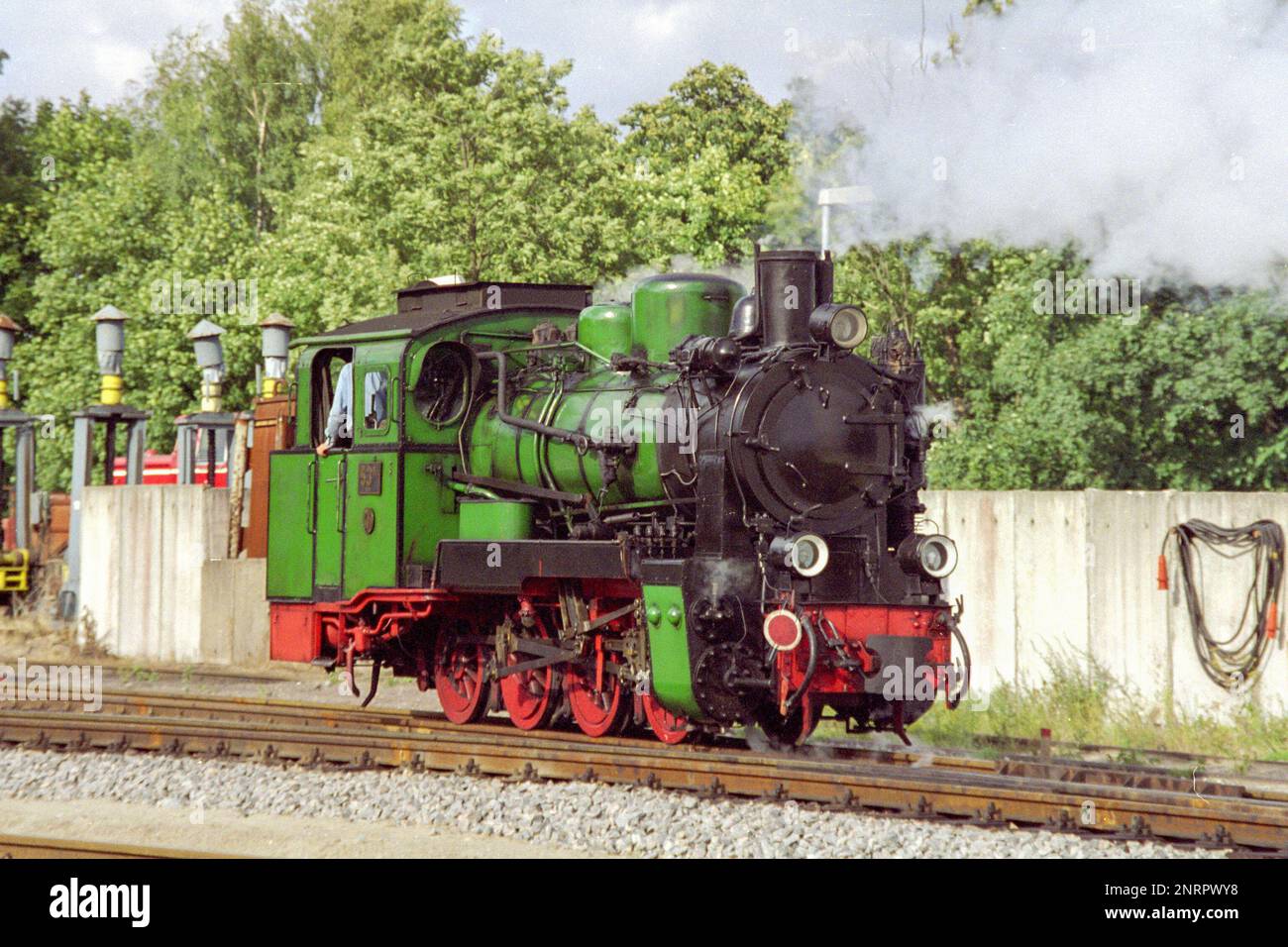 A steam train on the narrow gauge railway at Rugen in 1999 Stock Photo ...