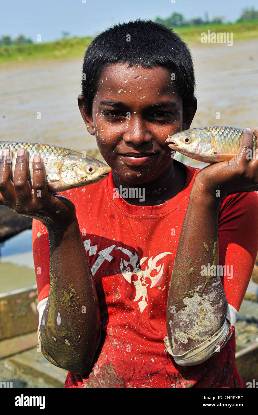 in Sylhet, Bangladesh. 27th Feb, 2023. Rural boy posing with Curp ...
