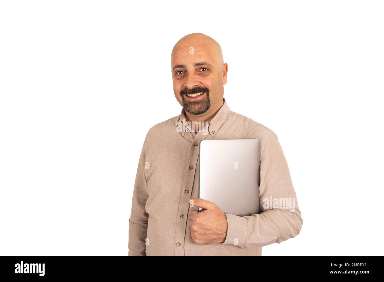 Smiling man hugging notebook. Isolated white background win concept ...