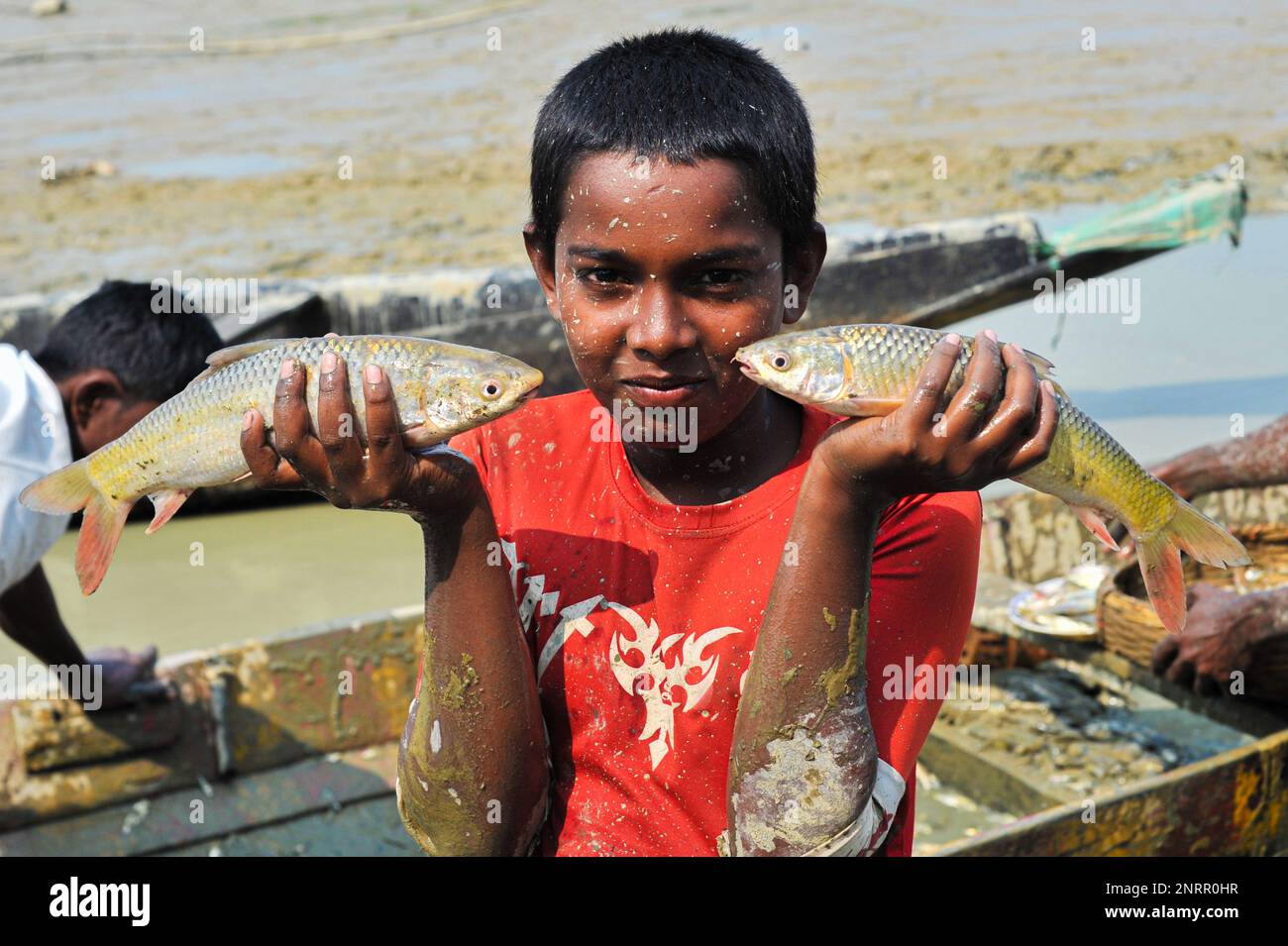 27 February 2023 in Sylhet-Bangladesh: Rural boy posing with Curp ...